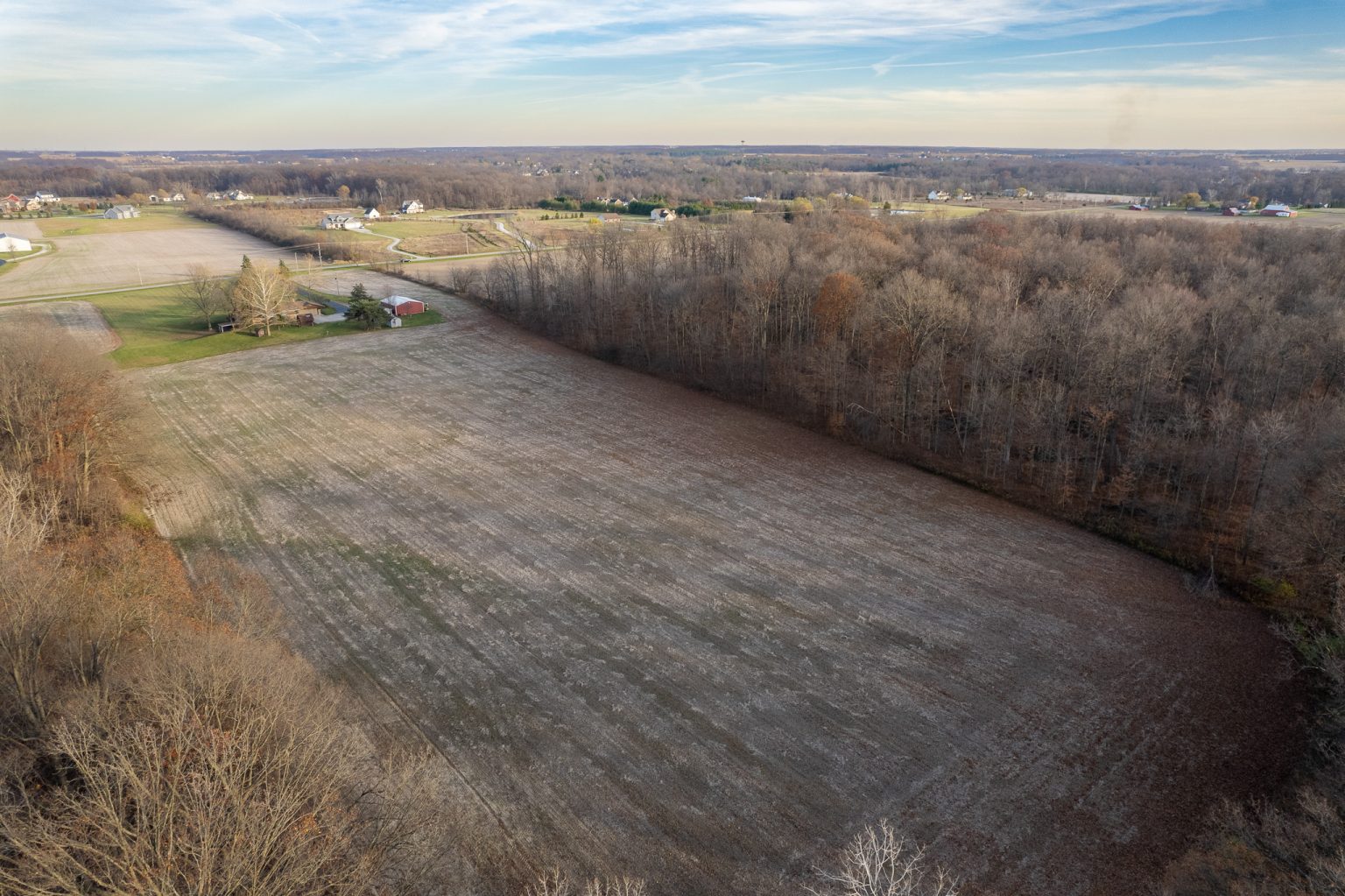 15 Acres split into 2 Tracts with Home & Outbuildings - Ness Bros.